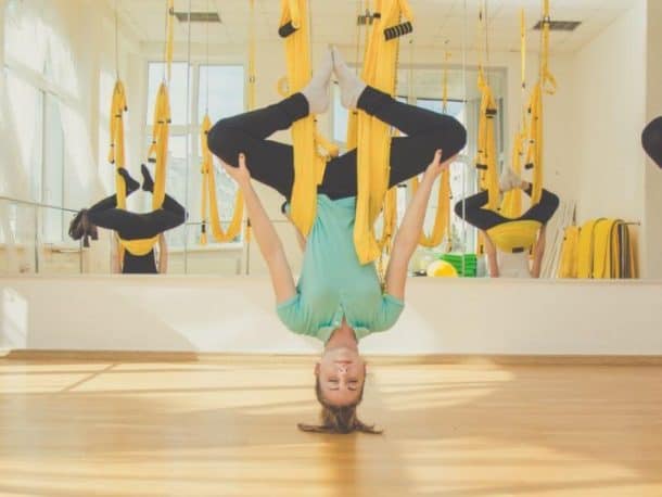 4 Aerial Yoga Poses for a Stronger & More Flexible Spine - Aerial Yoga Zone